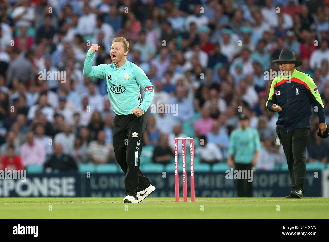 Gareth Batty of Surrey celebrates taking the wicket of Ravi Bopara ...