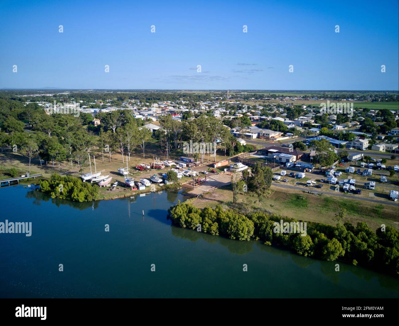 Aerial of boat slipyard on the banks of the Burnett River Bundaberg ...
