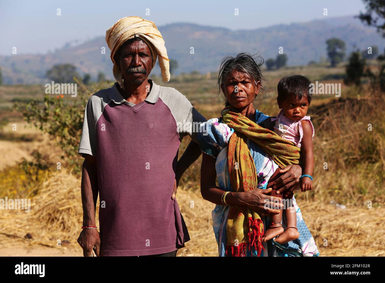 Tribal couple with their grandson at Madagada Village, Andhra Pradesh ...