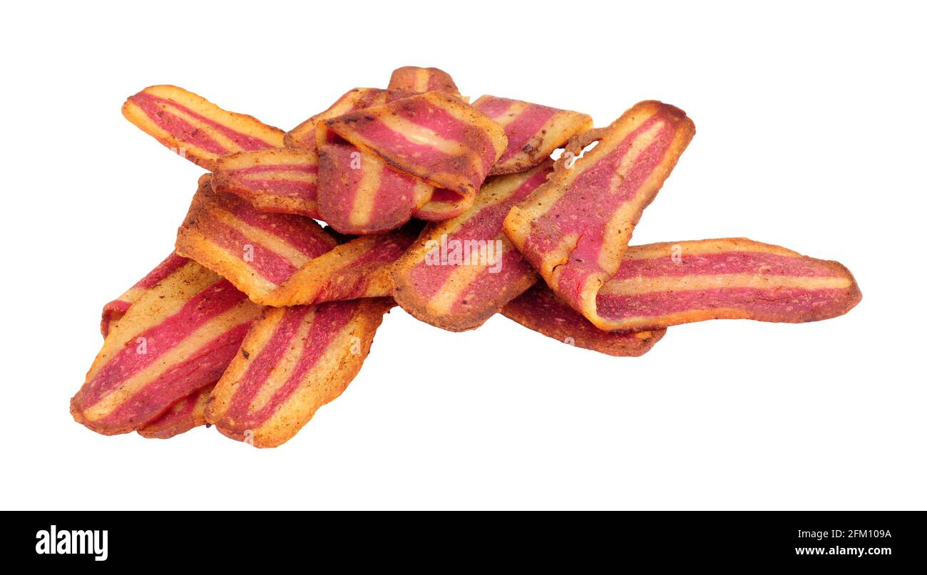 Fried crispy meat free plant based bacon rashers isolated on a white ...