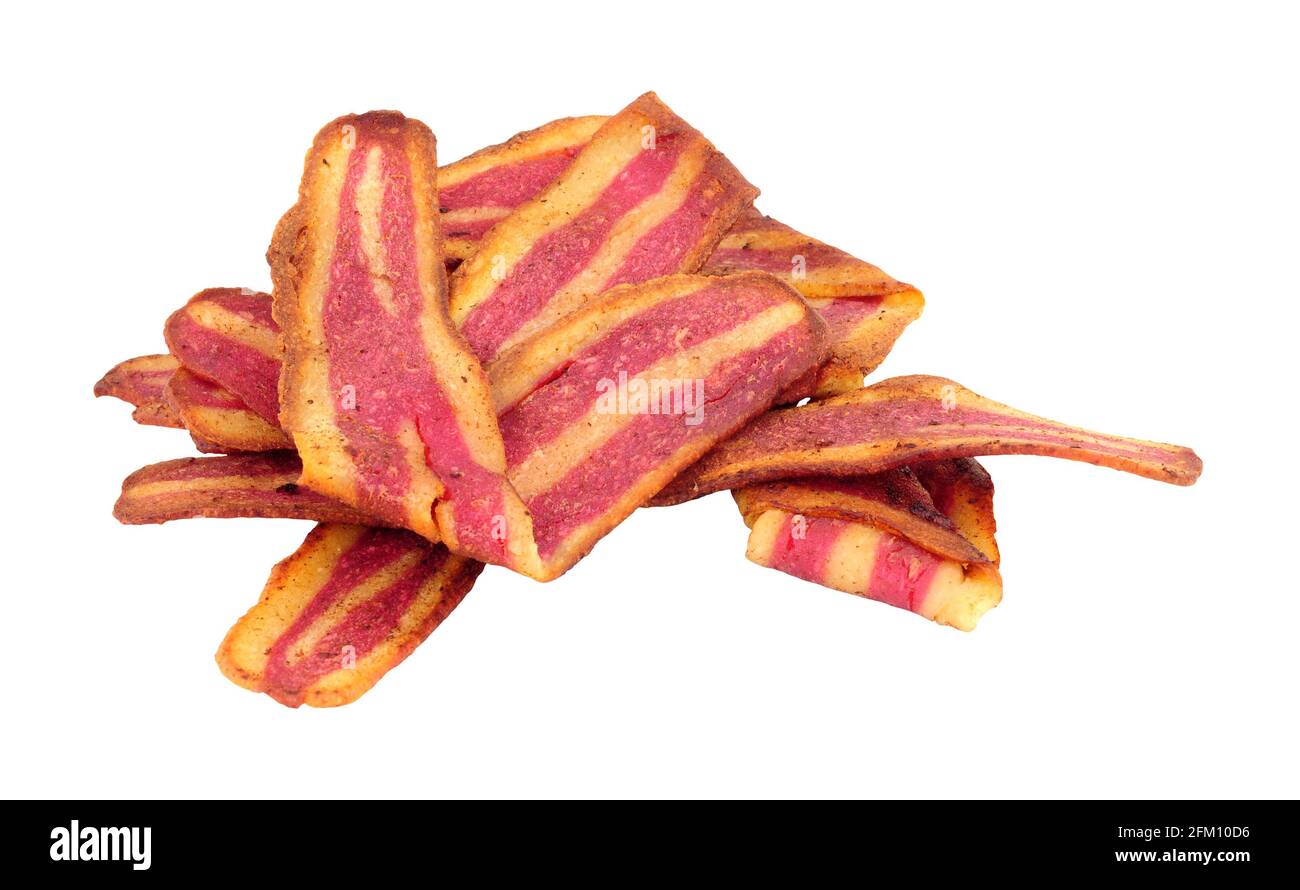 Fried crispy meat free plant based bacon rashers isolated on a white ...