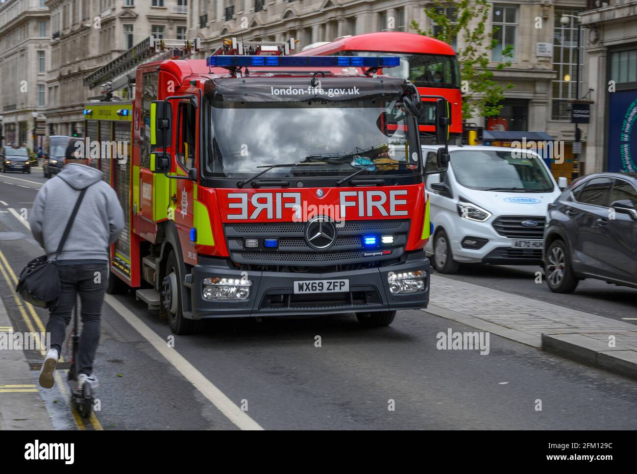 Fire Engine on emergency call drives wrong way down Regent Street past ...