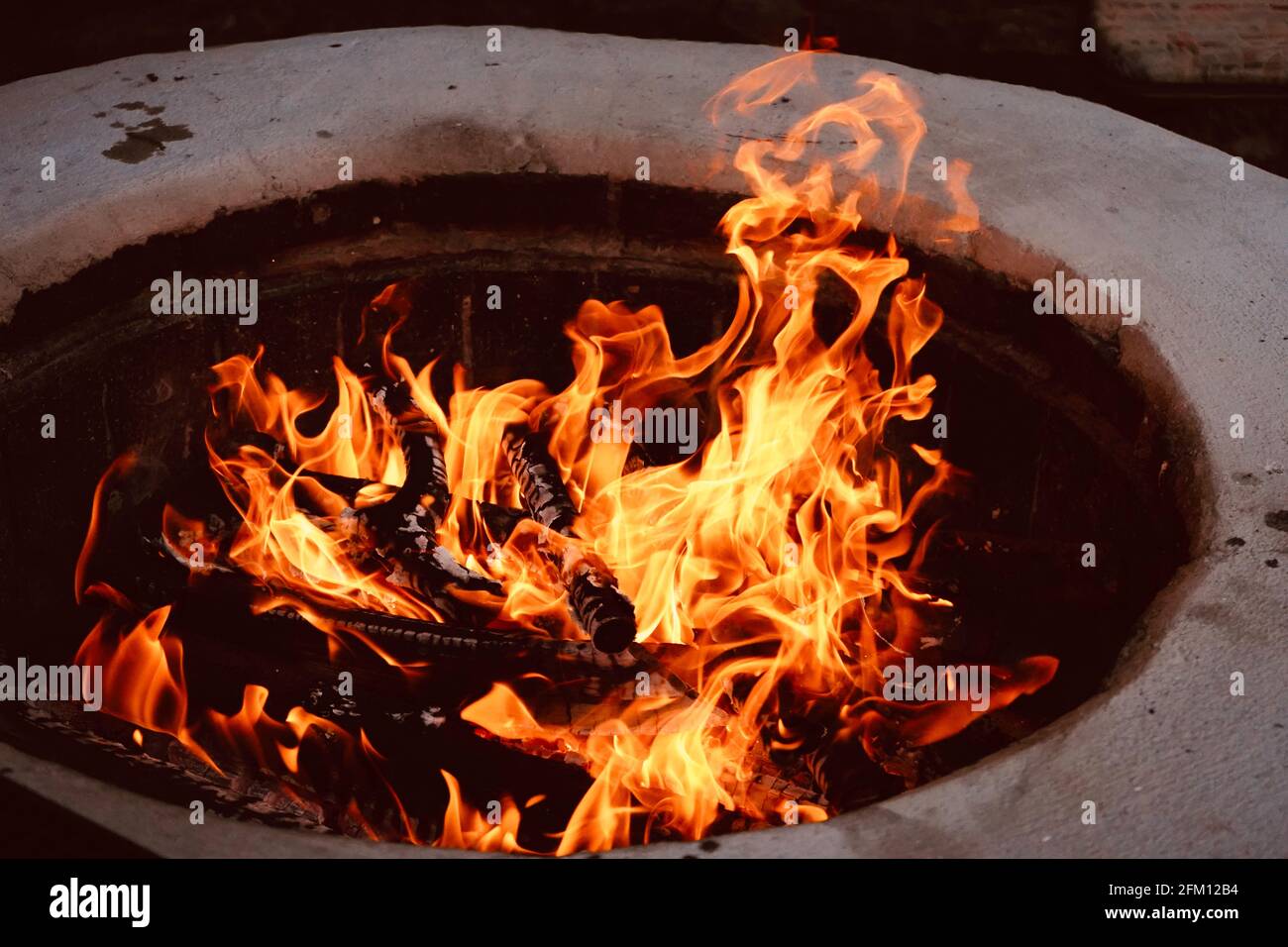 Hole burning hi-res stock photography and images - Alamy