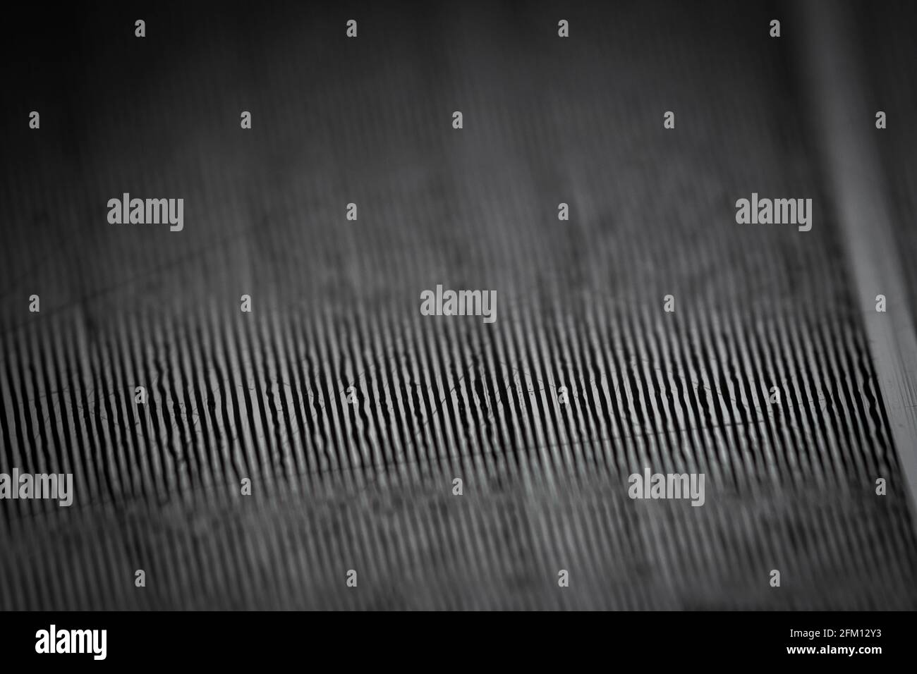Macro shot of black vinyl record showing scratches. Surface of an old ...