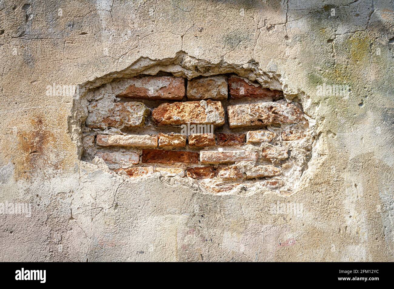 Old brick and plaster wall texture background. Painted distressed wall ...