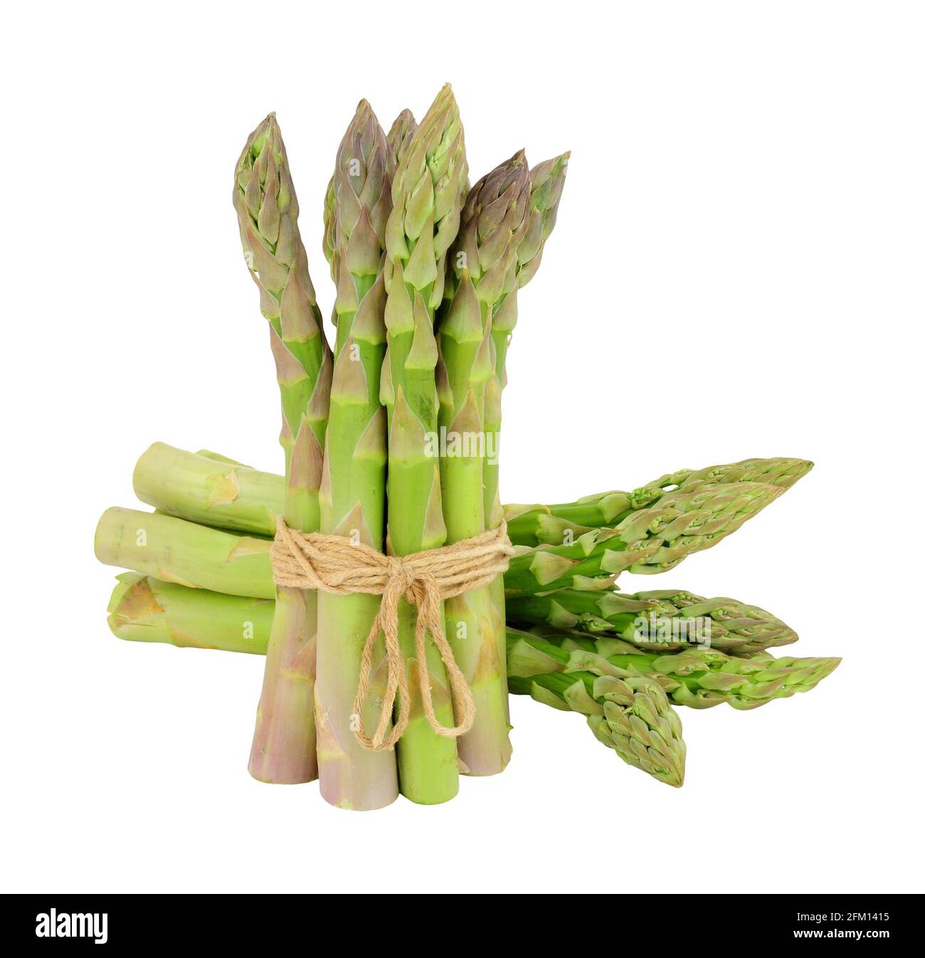 Bundles of fresh raw asparagus tips isolated on a white background ...