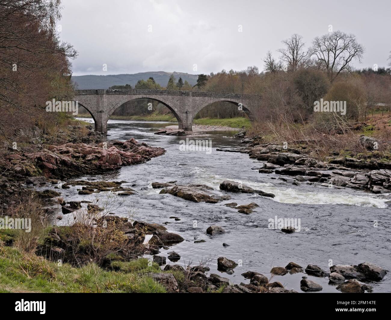 The Potarch Bridge over the River Dee on an early spring day Stock ...