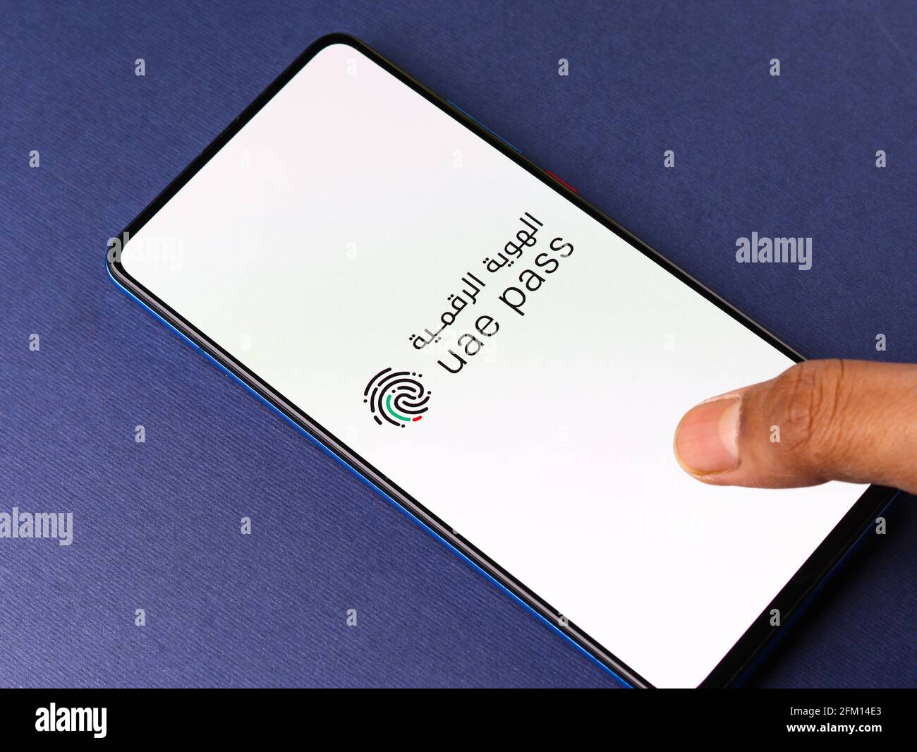 Assam, india - May 04, 2021 : UAE Pass logo on phone screen stock image ...