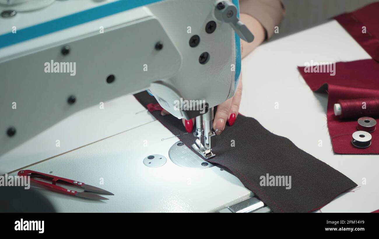 Closeup woman sewing machine hi-res stock photography and images - Alamy