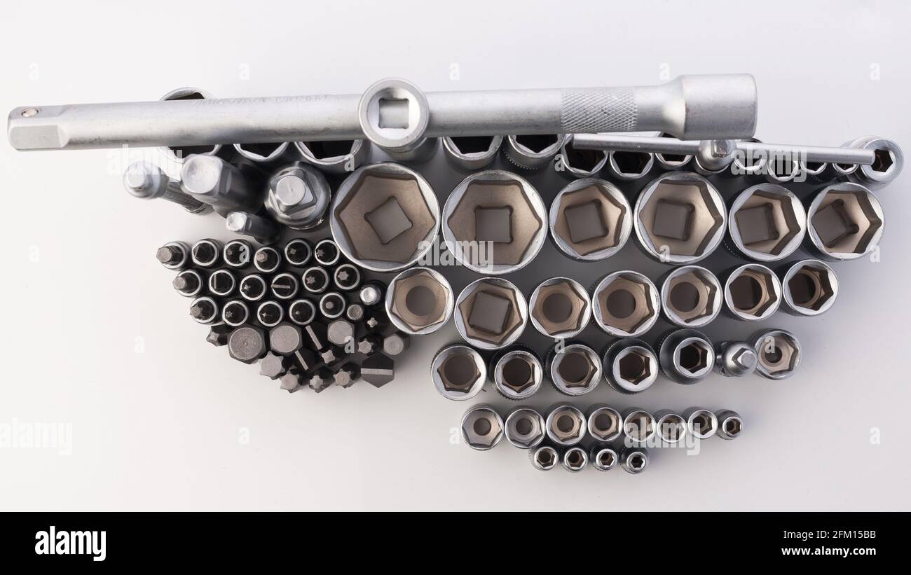 Repair kit for car repair on a white background. A set of wrenches and ...