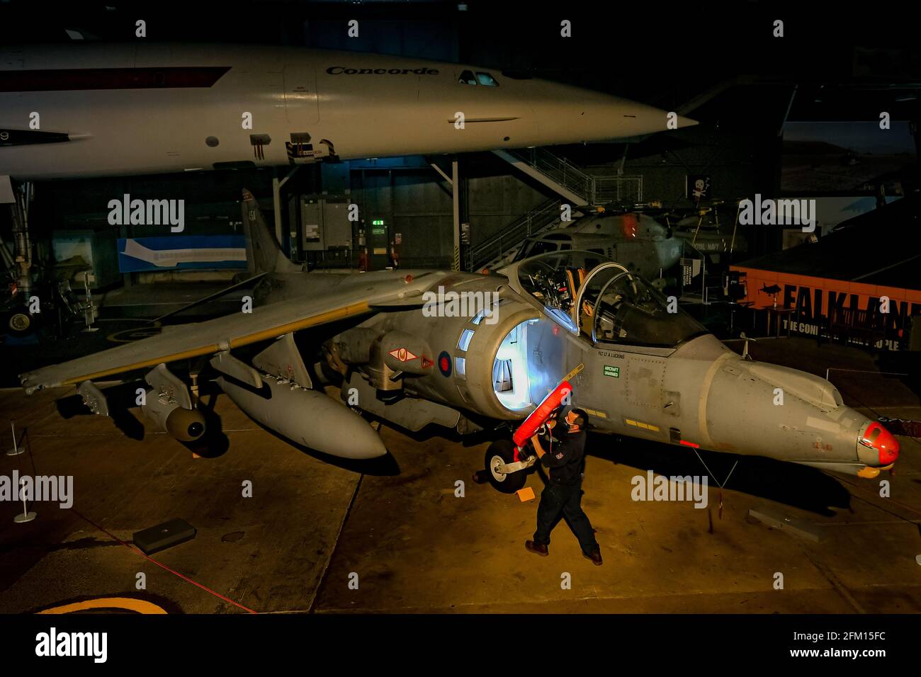 An engineer checks the air intake of a BAE Harrier GR9A at the Royal ...