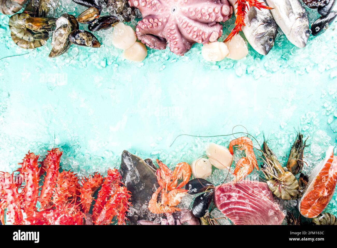 Set of various fresh raw seafood - octopus, crab, squid, shrimp prawn ...