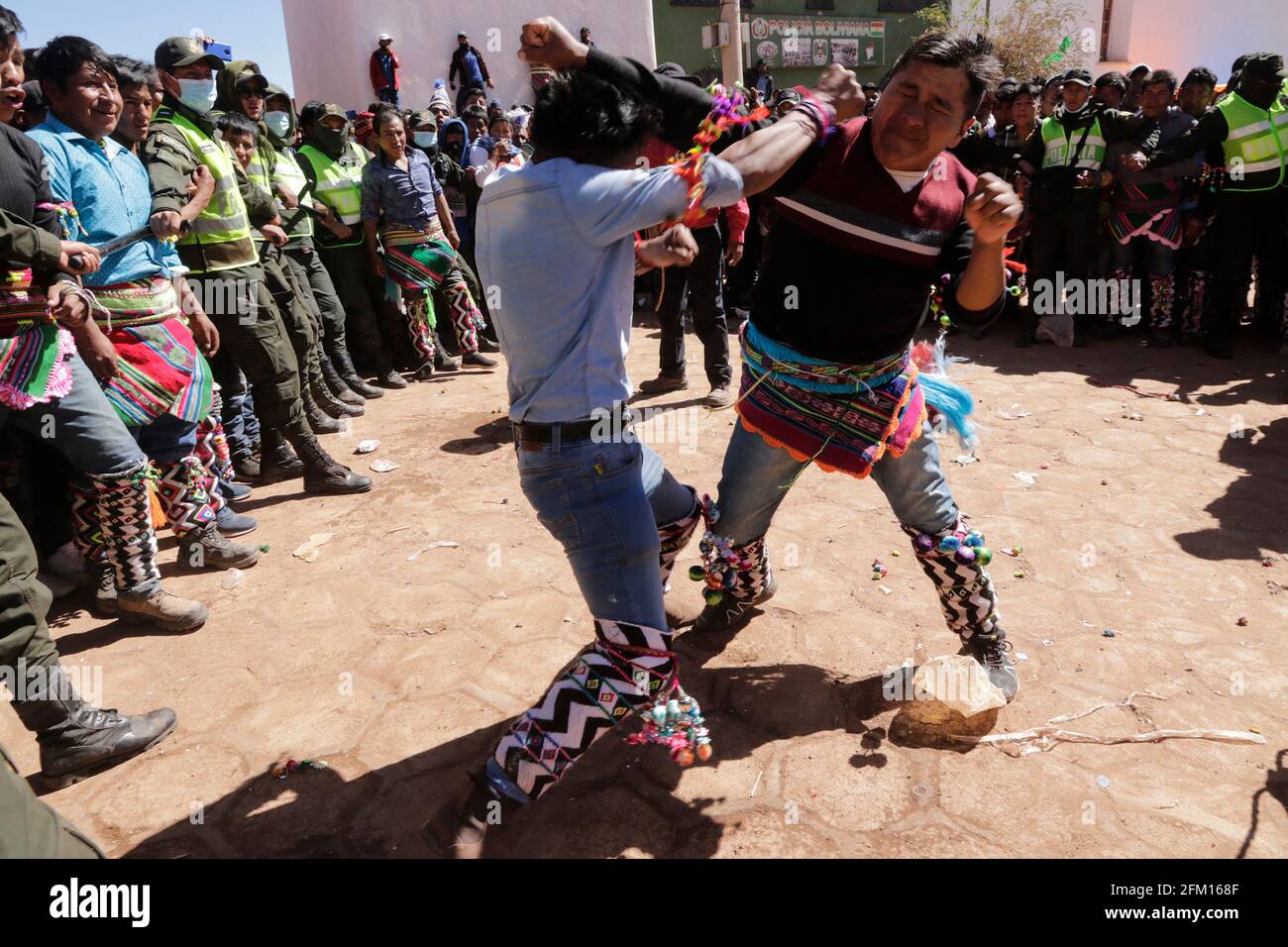 Macha, Bolivia. 04th May, 2021. Two men belonging to rival indigenous ...