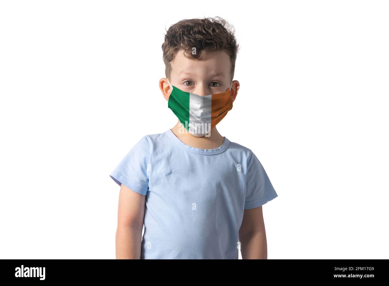 Respirator with flag of Ireland White boy puts on medical face mask ...