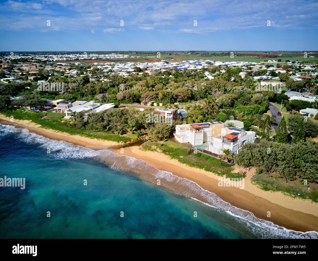 Aerial of the waterfront houses including the "Glass House" at Kellys ...