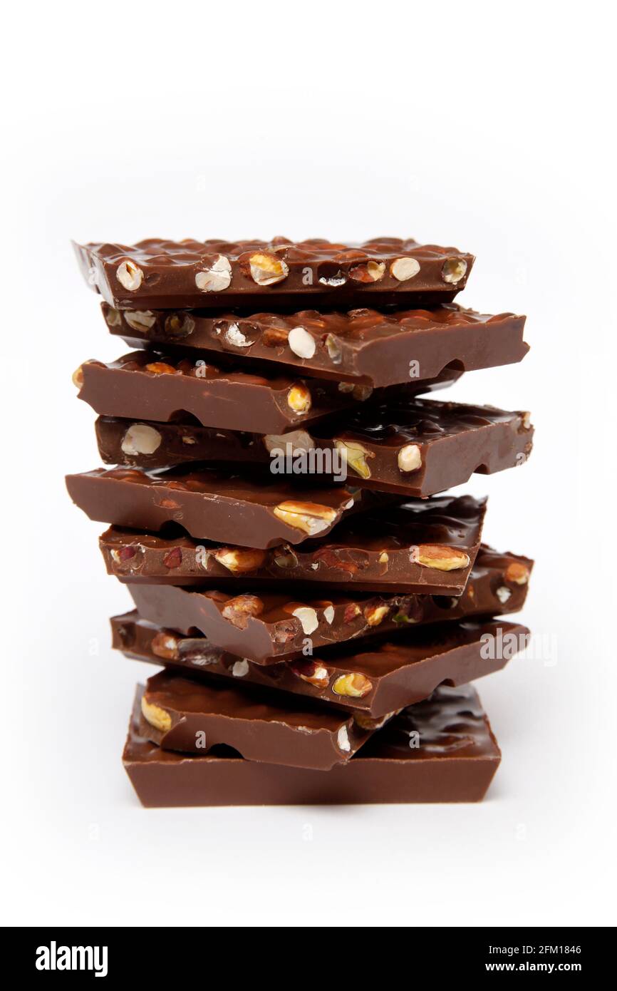 chocolate pieces on a white background Stock Photo - Alamy