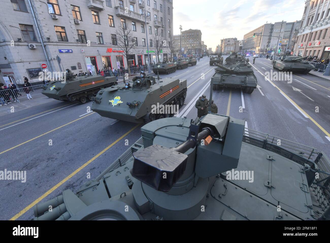 Moscow. T-90M tank `Proryv` (center) and BTR-MDM `Rakushka ' (left) on ...