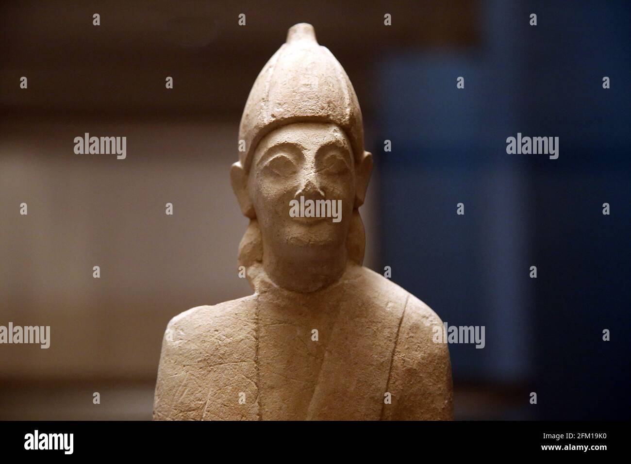 Statue of a devotee. Limestone. Santuary of Apollo, Tamassos. Carved ...