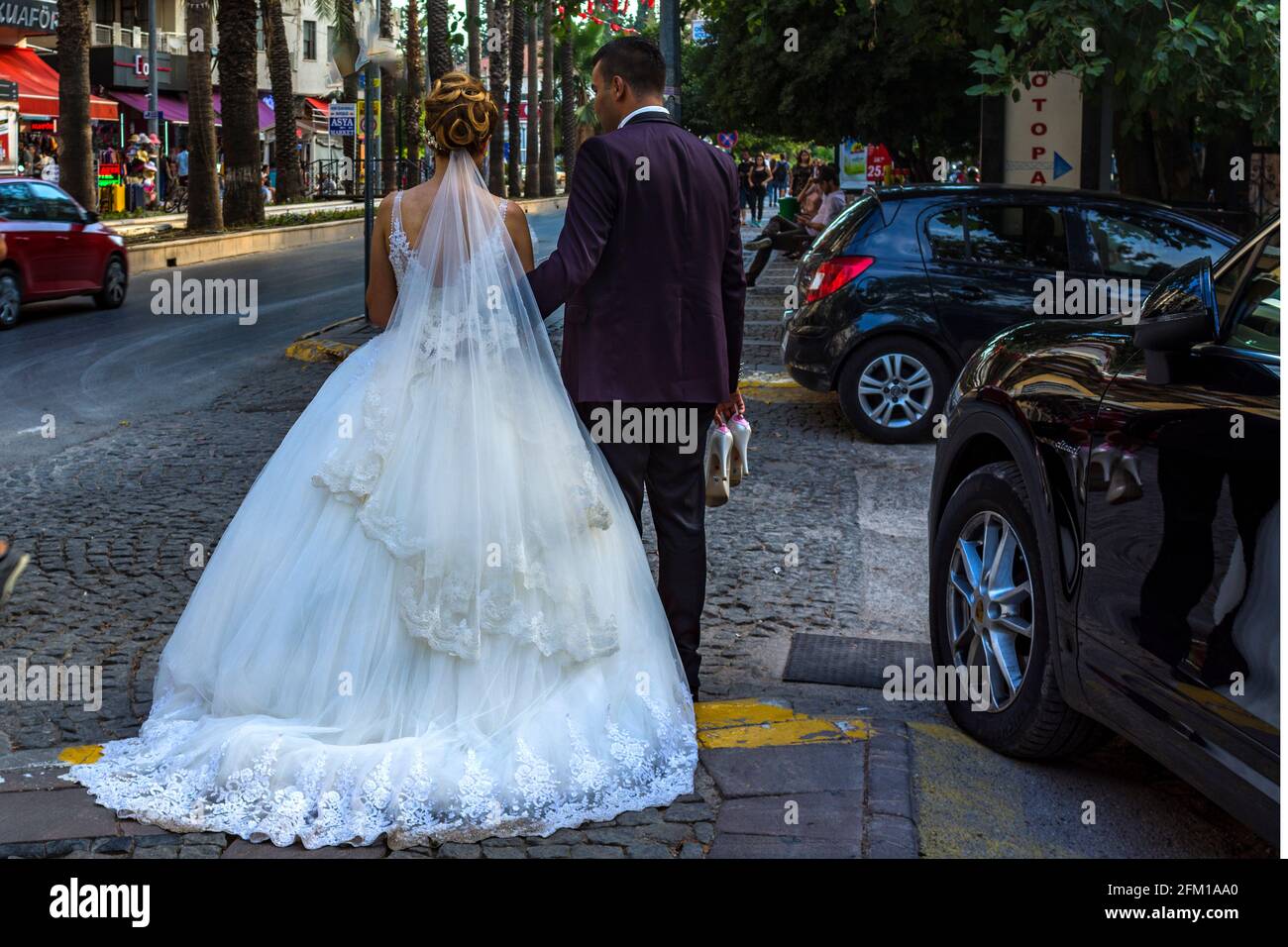 back view of bride and groom walking Stock Photo - Alamy