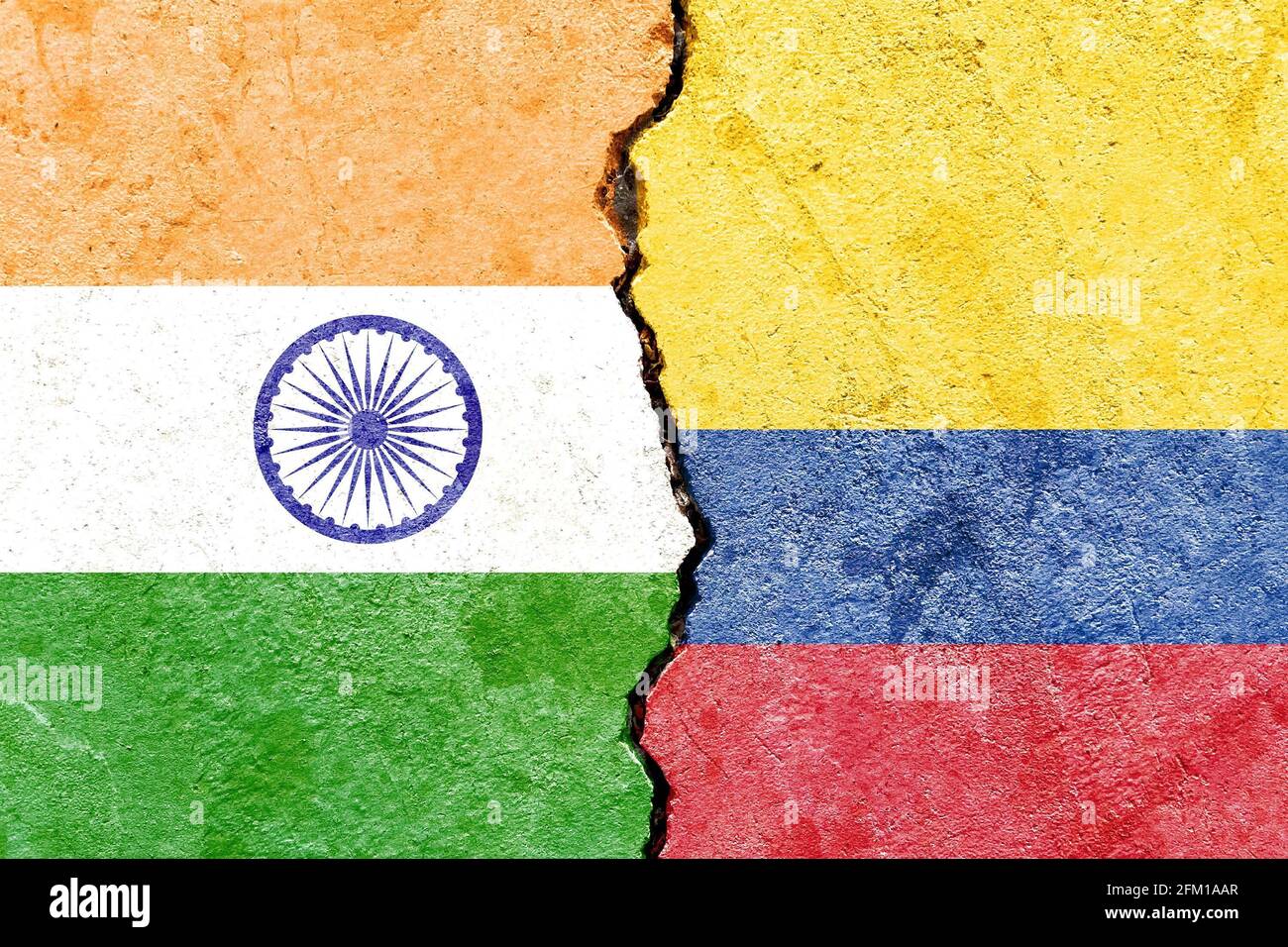 India flag and Colombia flag on a cracked wall background Stock Photo ...