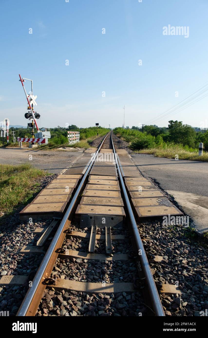 The automatic railroad crossing on the countryside road before the ...