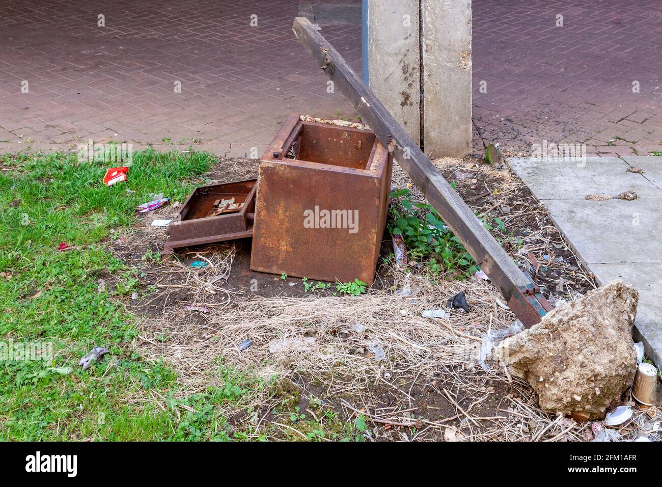 Heavy metal safe broken, dumped and rusted discarden near the town ...