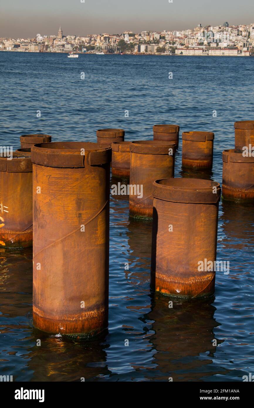 Weathered iron pipes in the water Stock Photo - Alamy