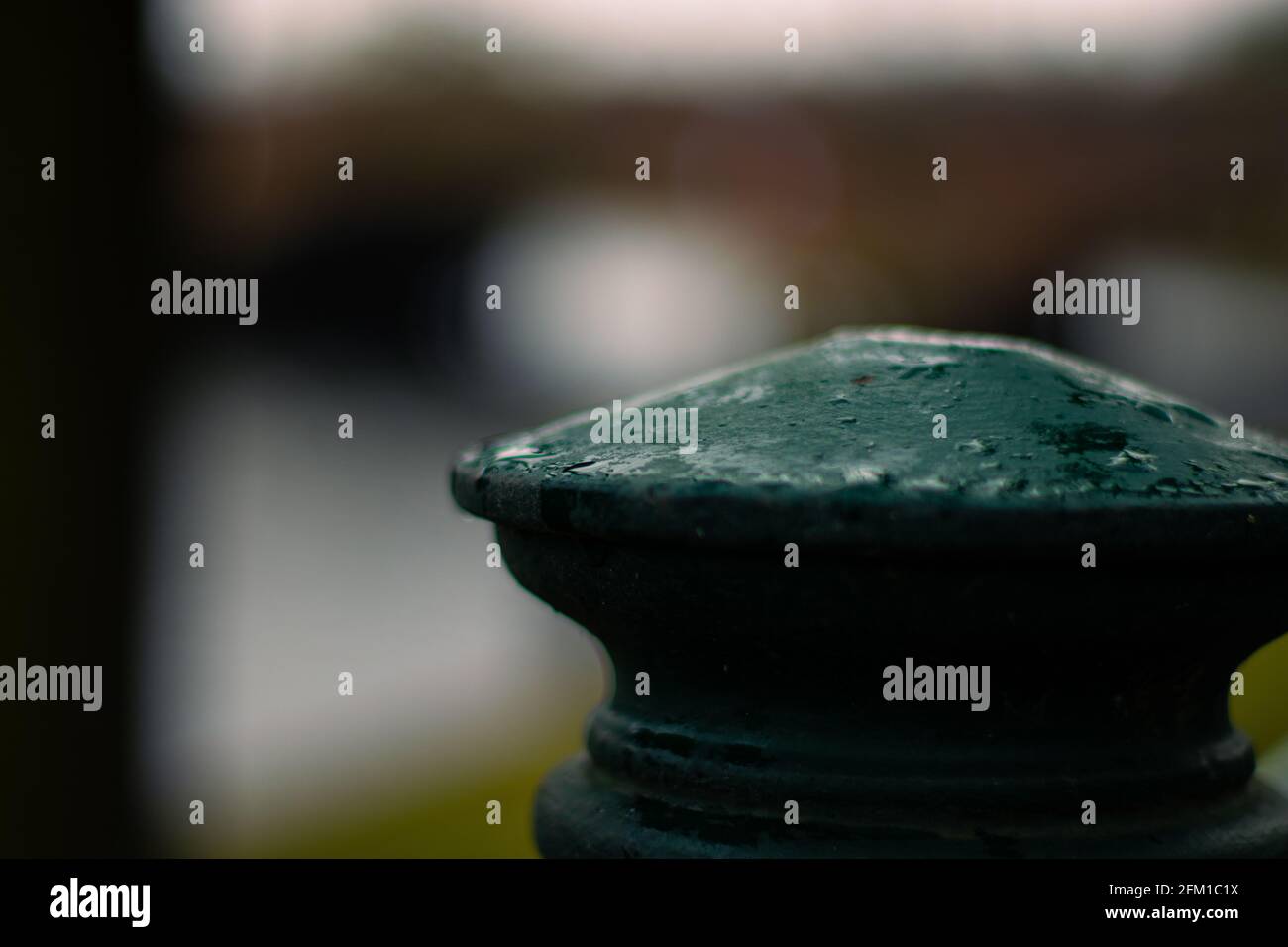 bollard in portrait with bridge Stock Photo - Alamy
