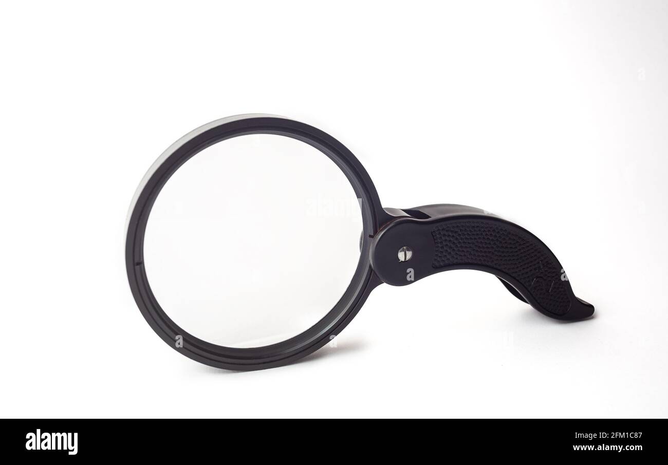 Magnifying glass on white background closeup, isolated Stock Photo - Alamy