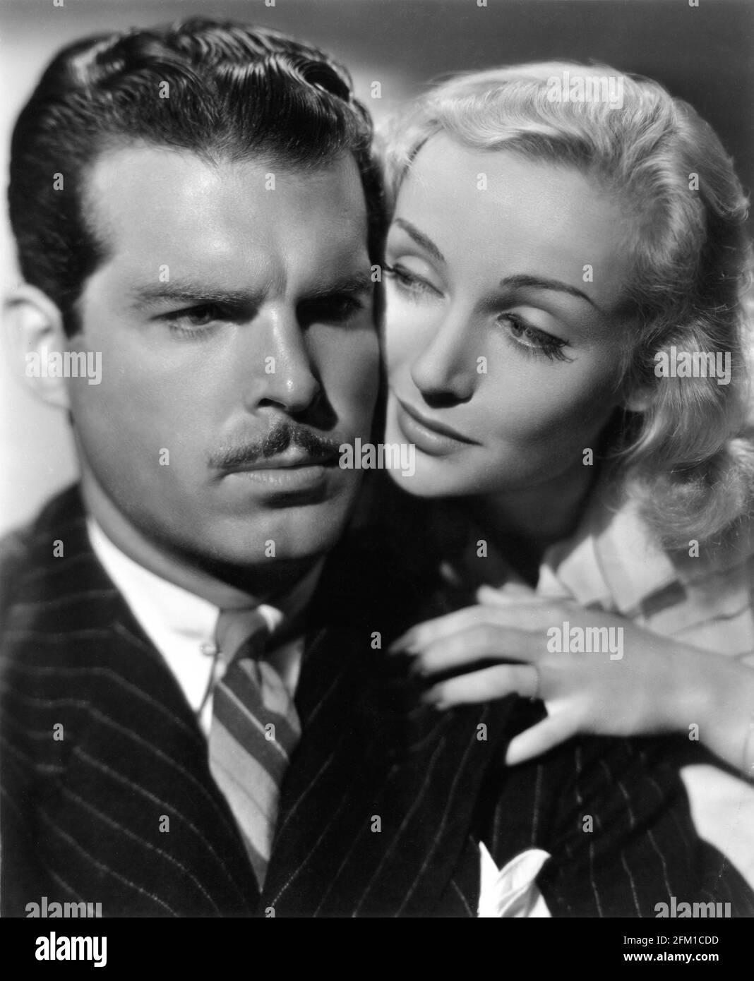 FRED MacMURRAY and CAROLE LOMBARD Publicity portrait in TRUE CONFESSION ...