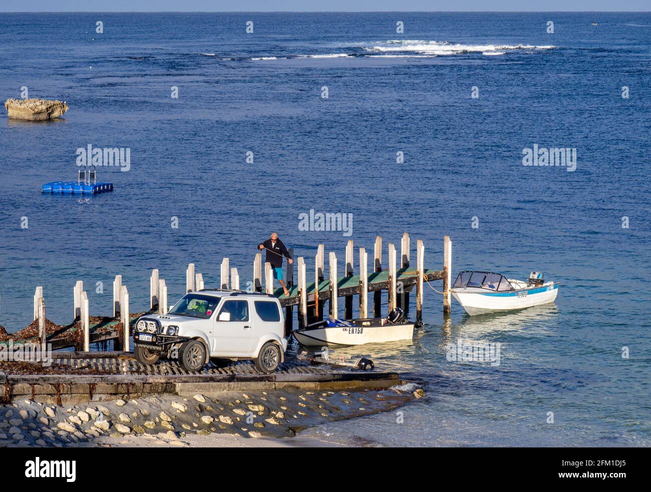 Launching small boat beach hi-res stock photography and images - Alamy