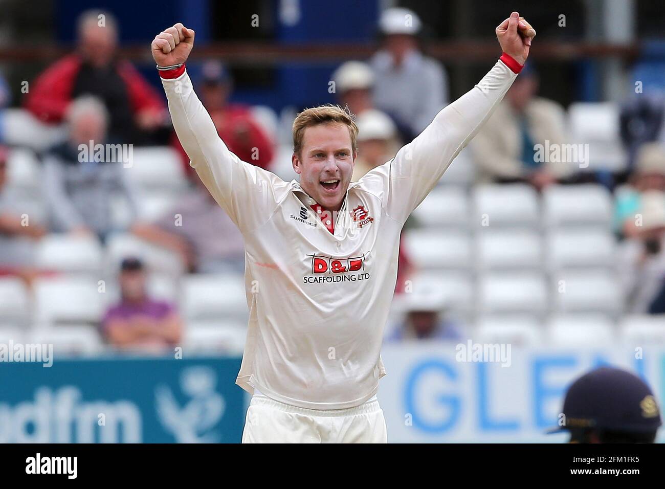 Simon Harmer of Essex celebrates taking the wicket of Darren Stevens ...