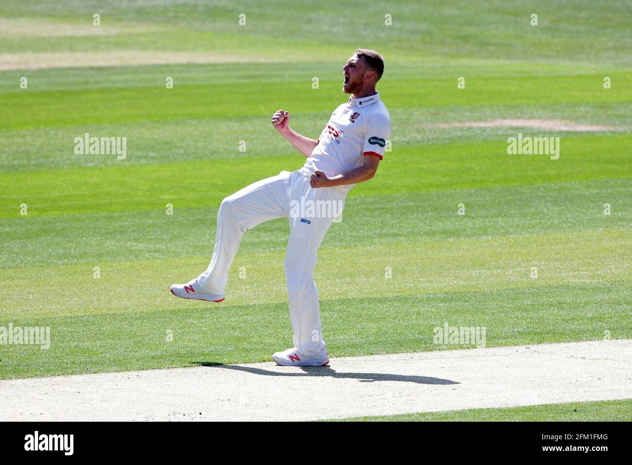 Jamie Porter of Essex celebrates taking the wicket of Ben Duckett ...