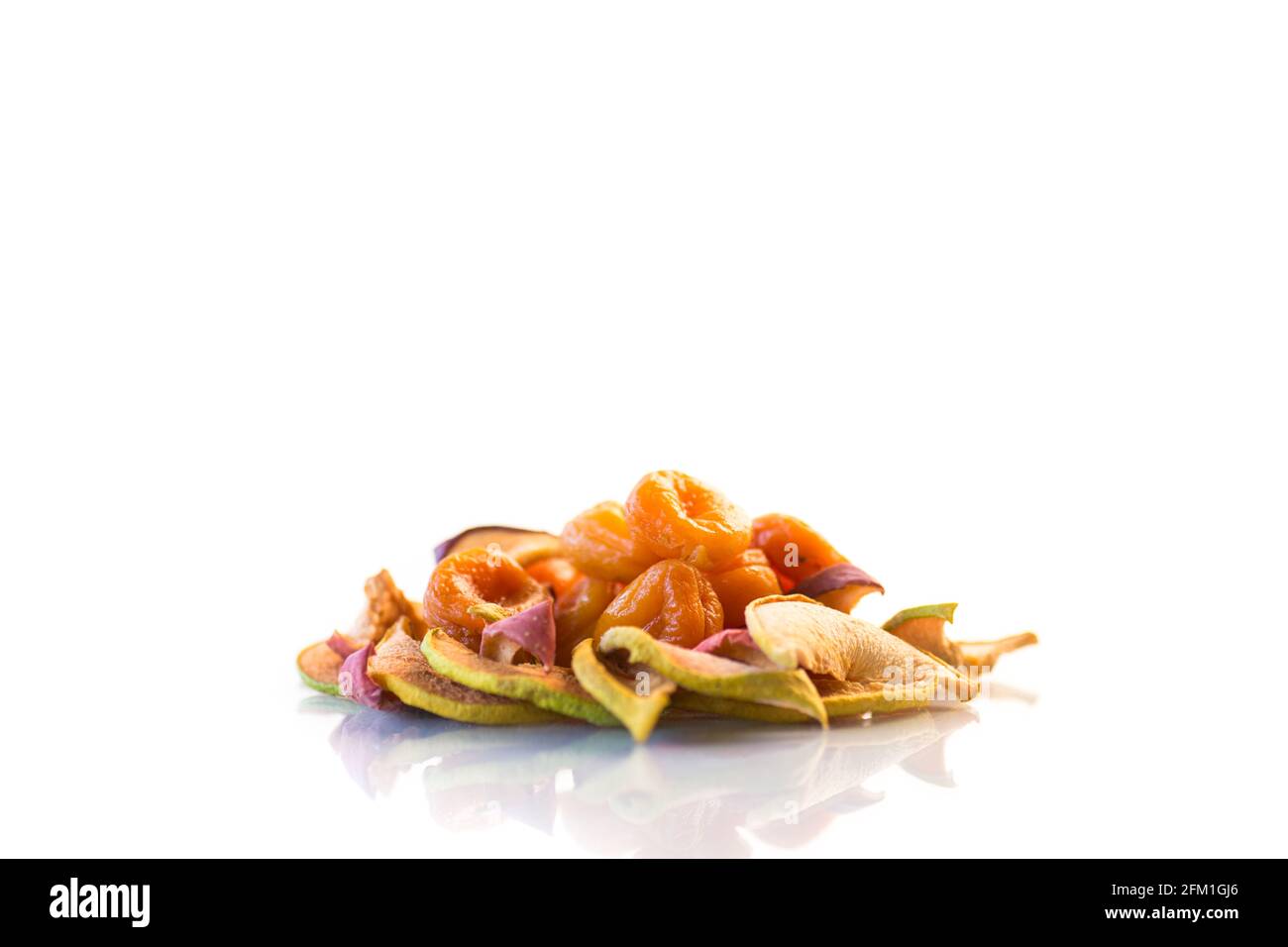 handful of sweet natural organic dried fruits isolated on white ...