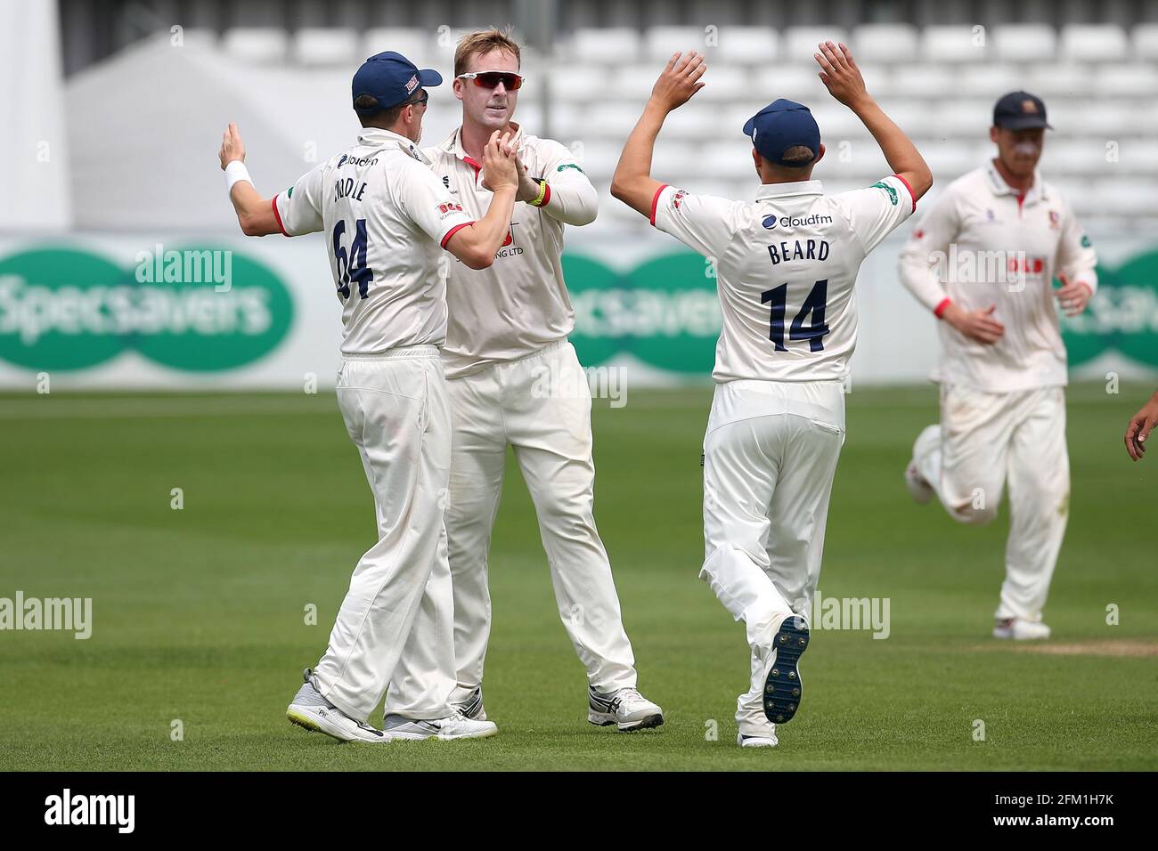 Simon Harmer of Essex celebrates with his team mates after taking the ...
