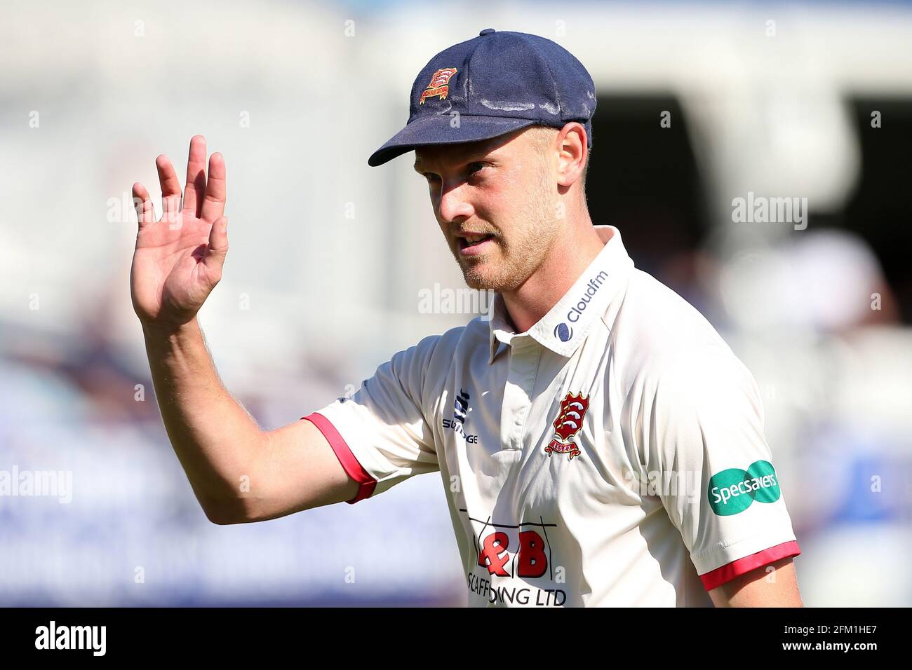 Jamie Porter of Essex acknowledges the crowd after taking his fifth ...