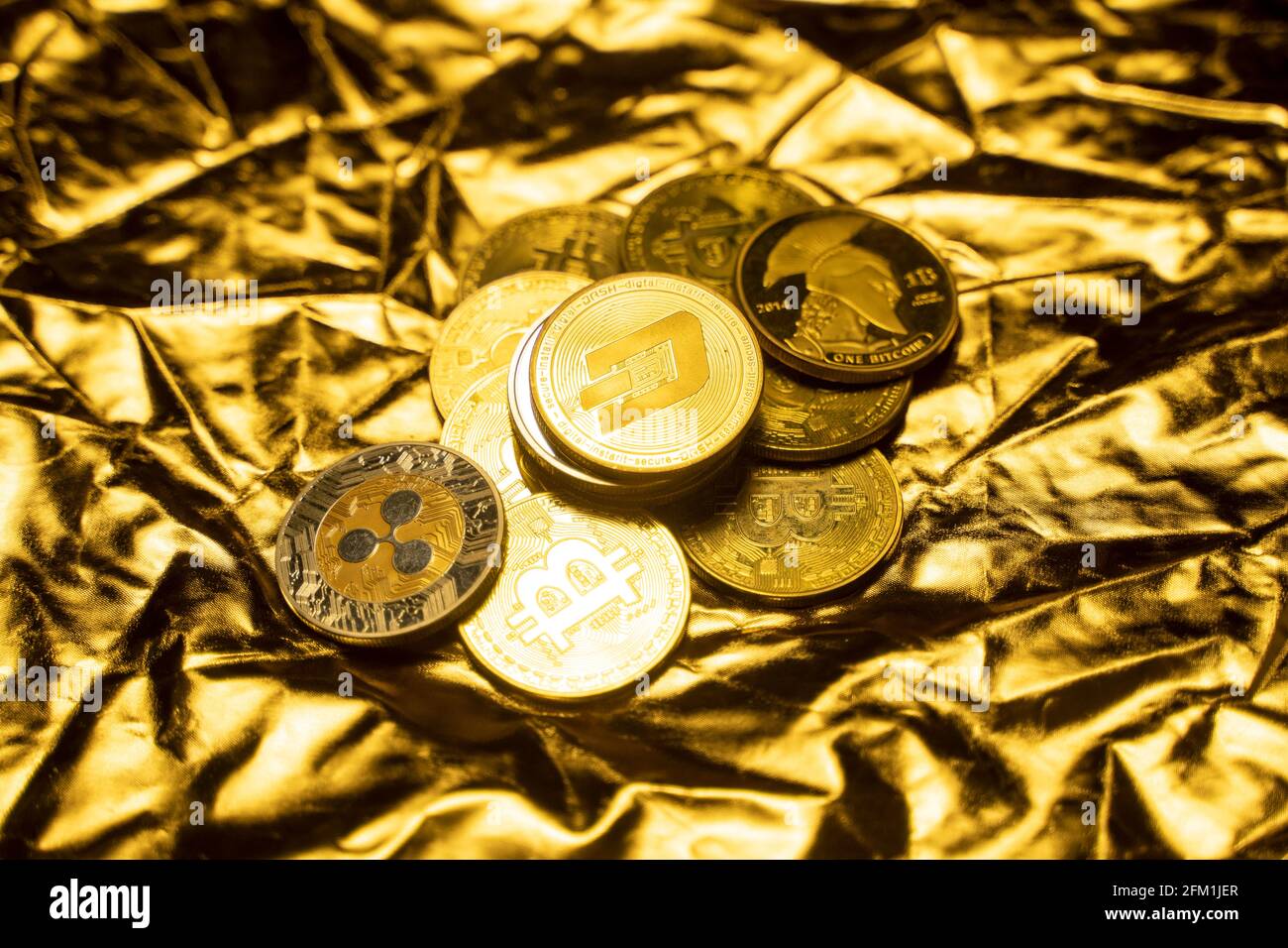 Gold Dash coins on a golden background. Trading on the cryptocurrency ...