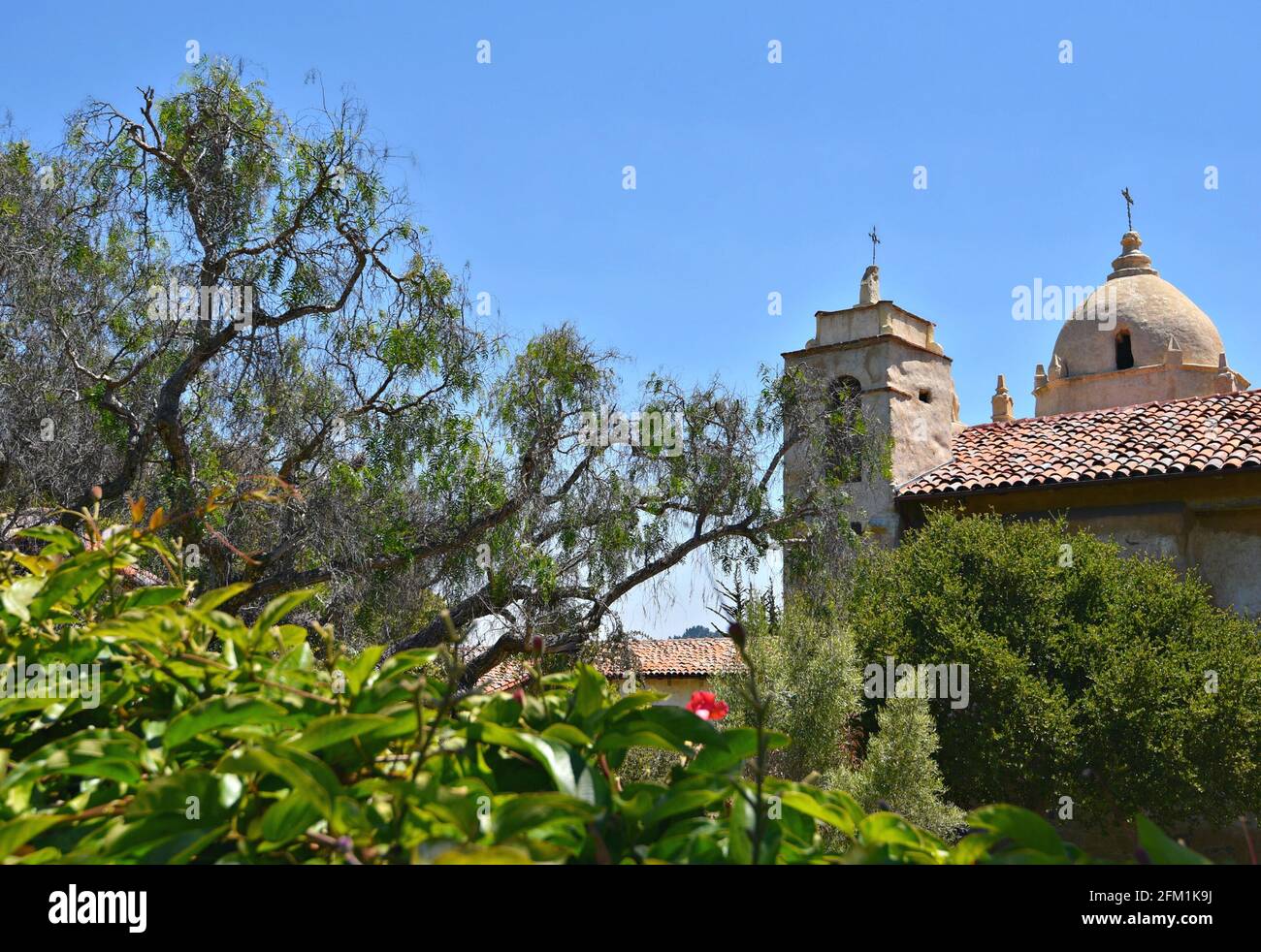 Landscape with scenic view of Mission San Carlos Borromeo de Carmelo, a ...