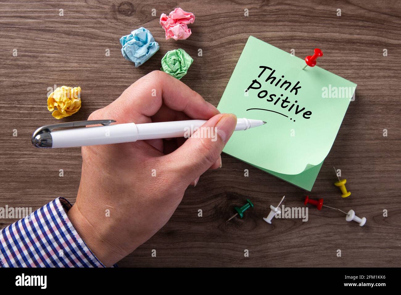 Man Hand Writing A Word Of Think Positive. Optimistic Attitude Mindset ...