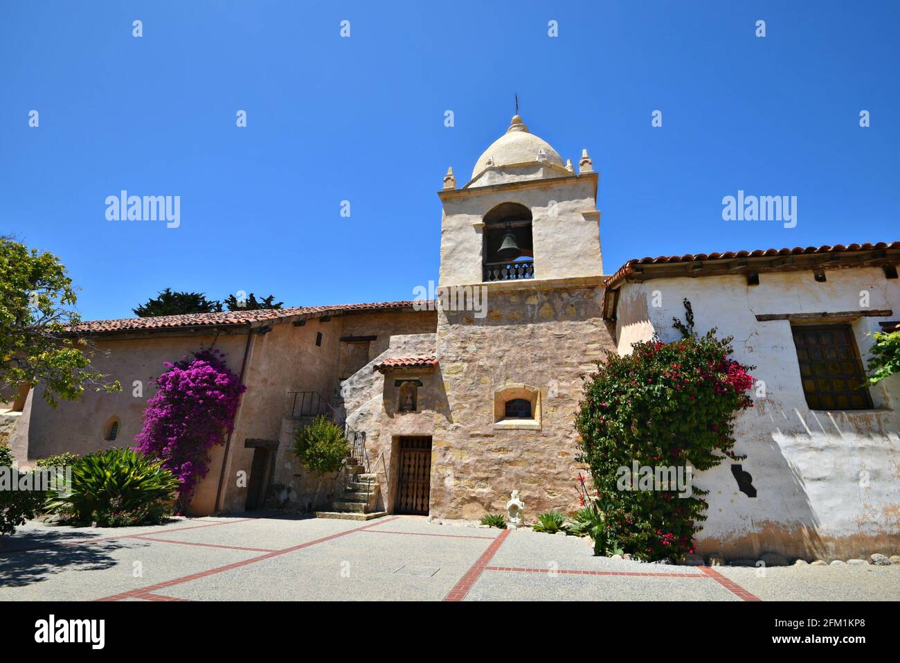 Landscape with scenic view of Mission San Carlos Borromeo de Carmelo, a ...