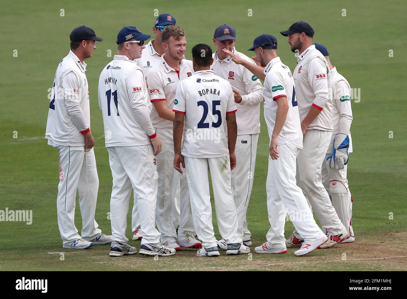 Sam Cook of Essex celebrates with his team mates after taking the ...