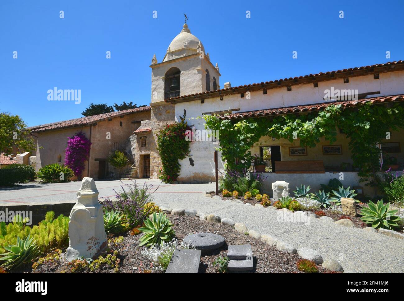 Landscape with scenic view of Mission San Carlos Borromeo de Carmelo, a ...