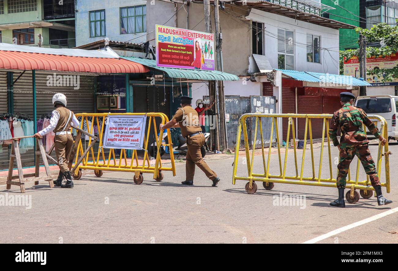 Colombo, Sri Lanka. 05th May, 2021. Sri Lankan police officers check vehicles at a checkpoint at ...