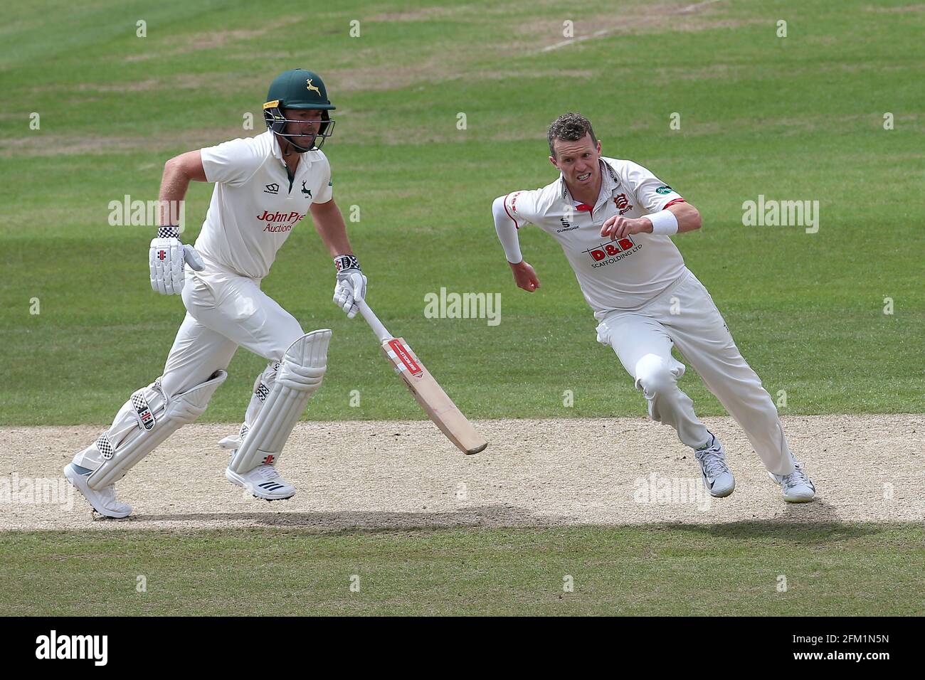 Peter Siddle of Essex nearly collides with Nottinghamshire batsman ...