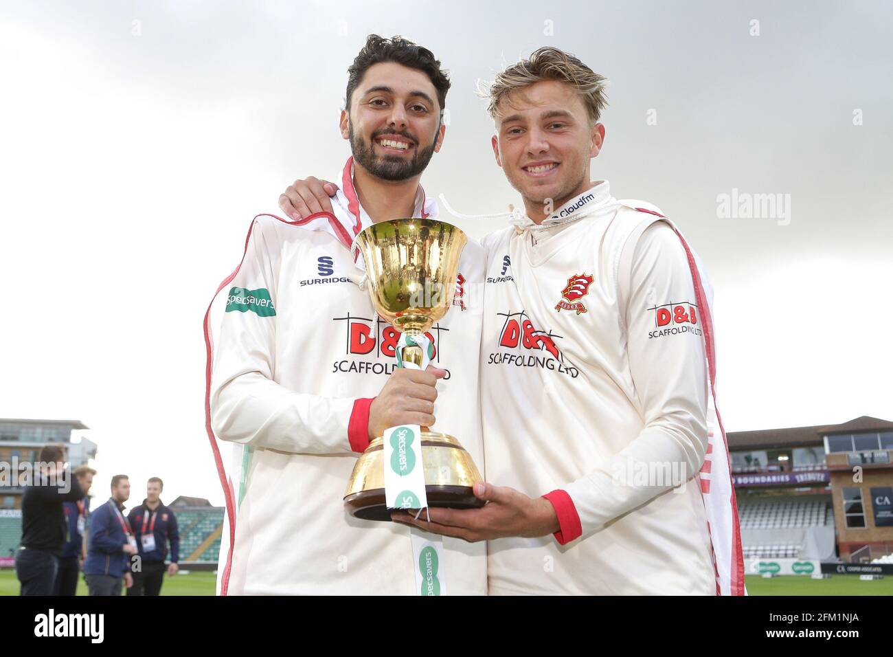 Aron Nijjar (L) and Aaron Beard of Essex with the Championship Trophy ...