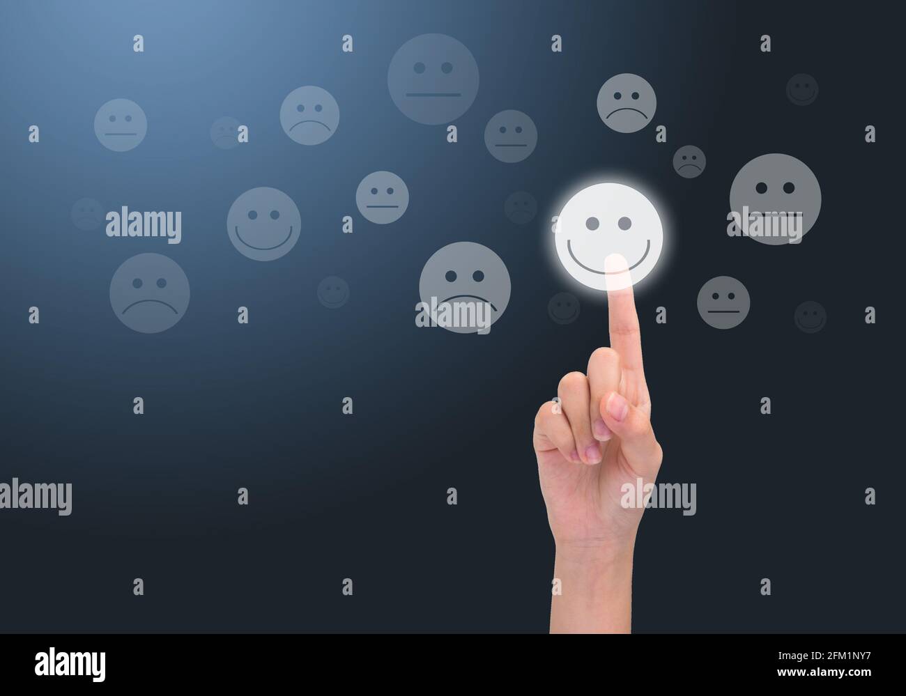 Quality control concept. lady hand choosing a happy button Stock Photo ...