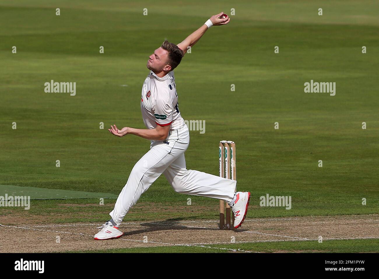 Sam Cook in bowling action for Essex during Warwickshire CCC vs Essex ...