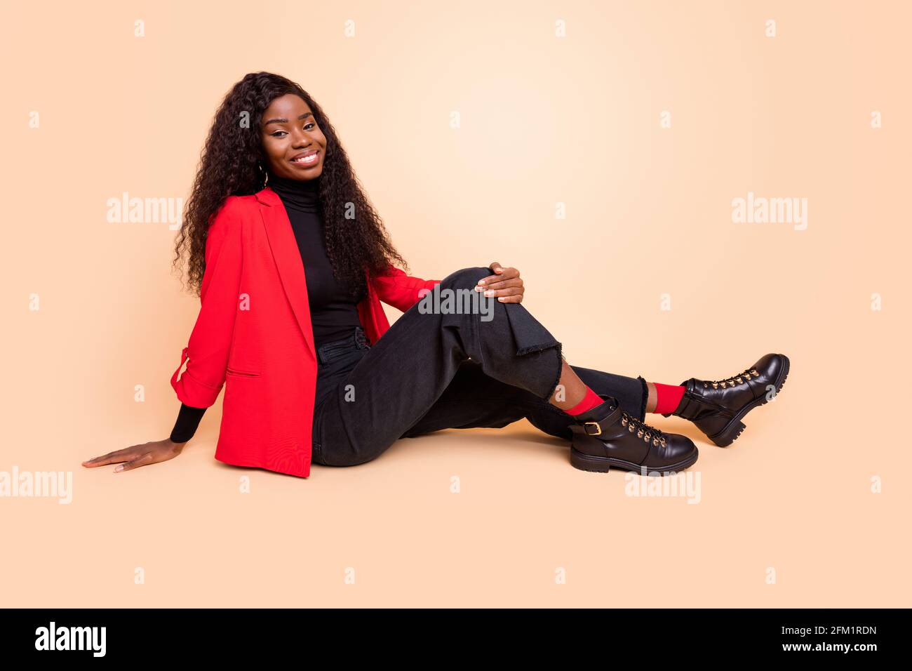 Full length profile side photo of dark skin lady happy mood sit floor ...