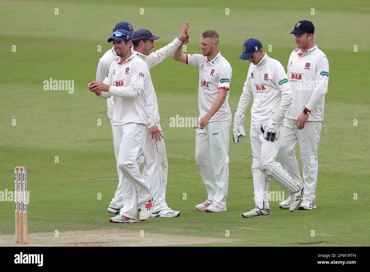 Jamie Porter of Essex celebrates with his team mates after taking the ...