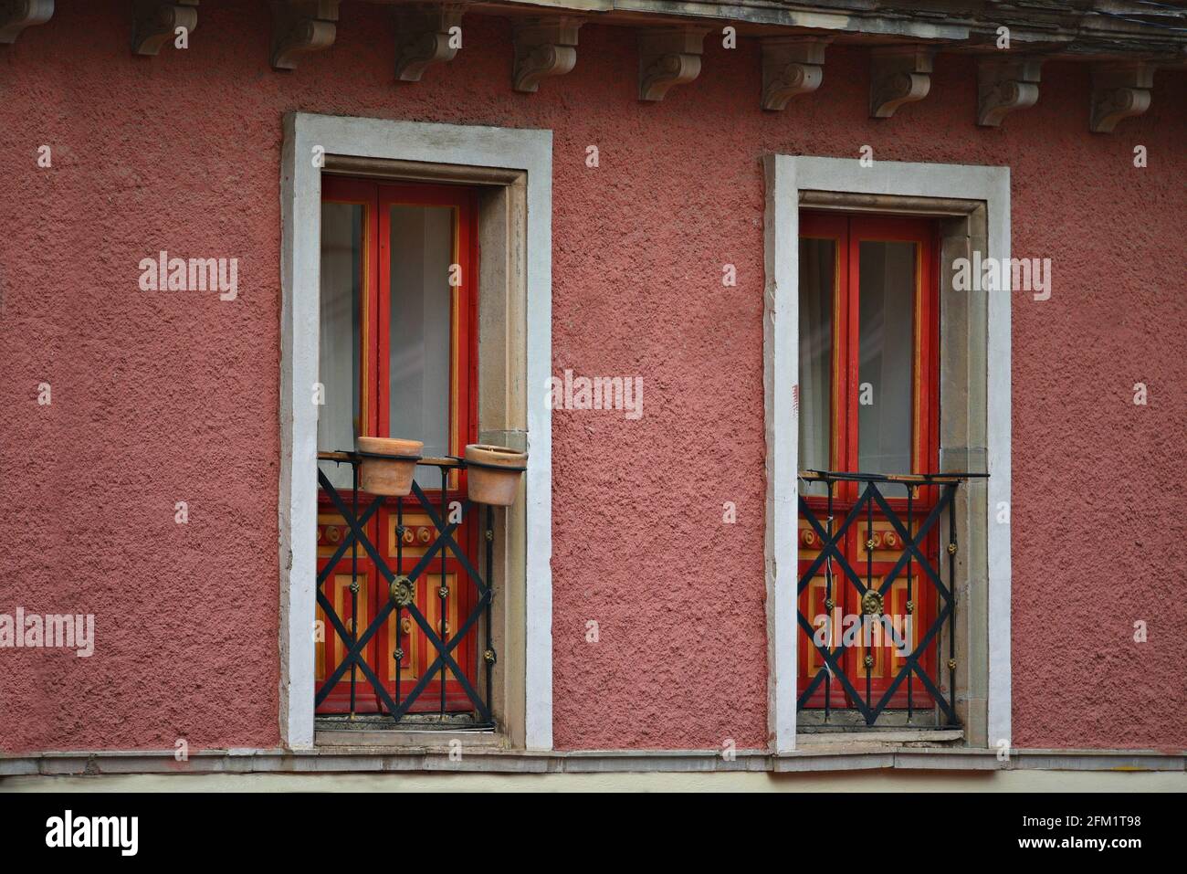 Spanish Colonial building facade with a Venetian stucco wall and white ...